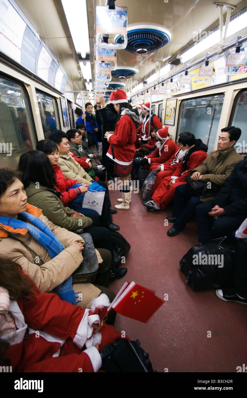 China, Beijing. Foreign and Chinese residents dressed up as Santa on a ...