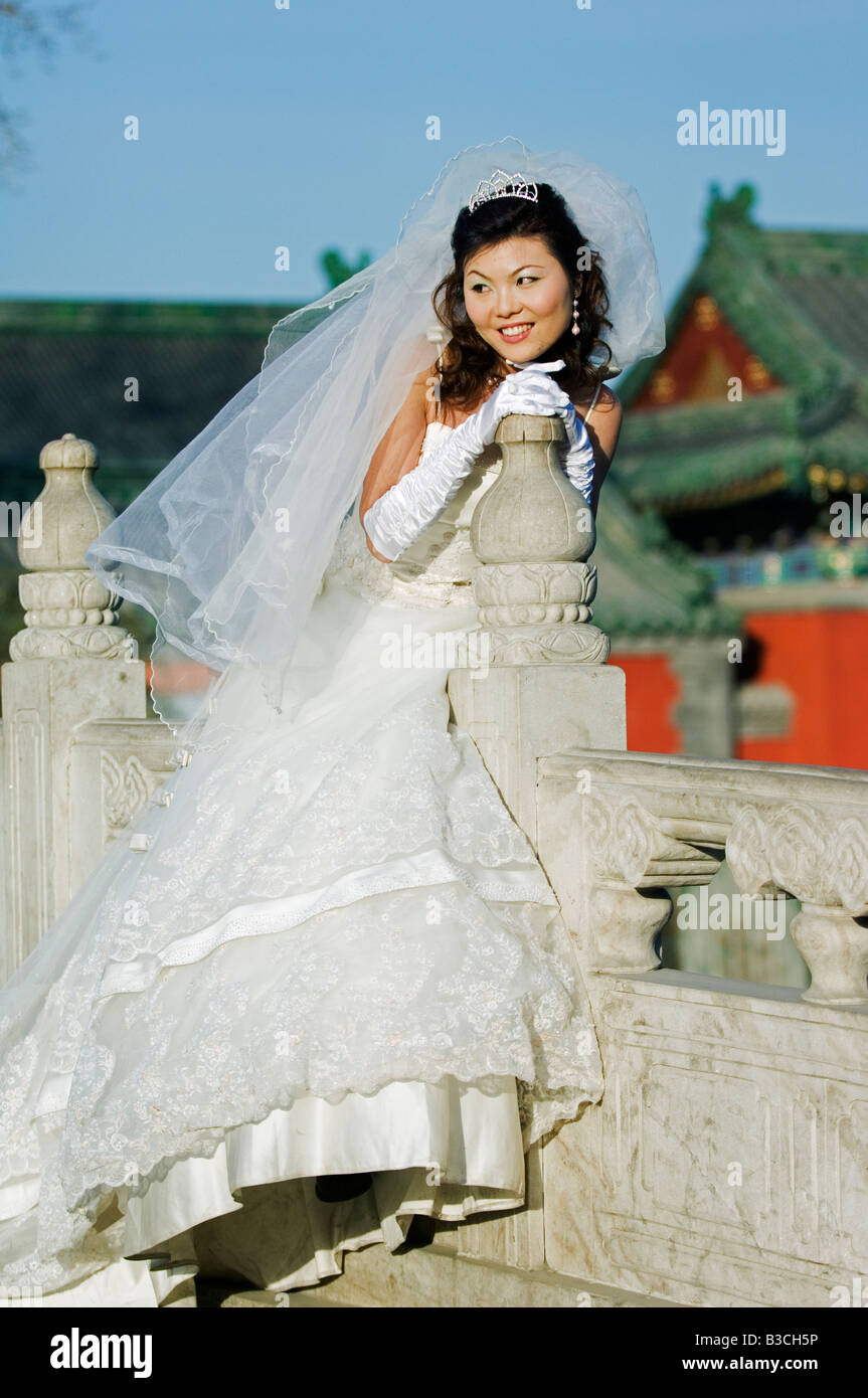 Asian bride western wedding dress hi-res stock photography and images ...