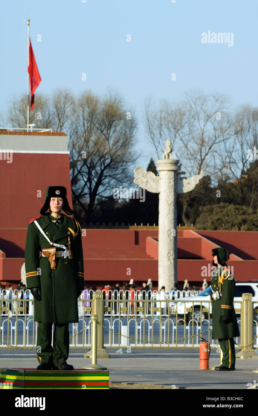 China, Beijing, Tiananmen Square. Guards on duty in front of the Gate ...