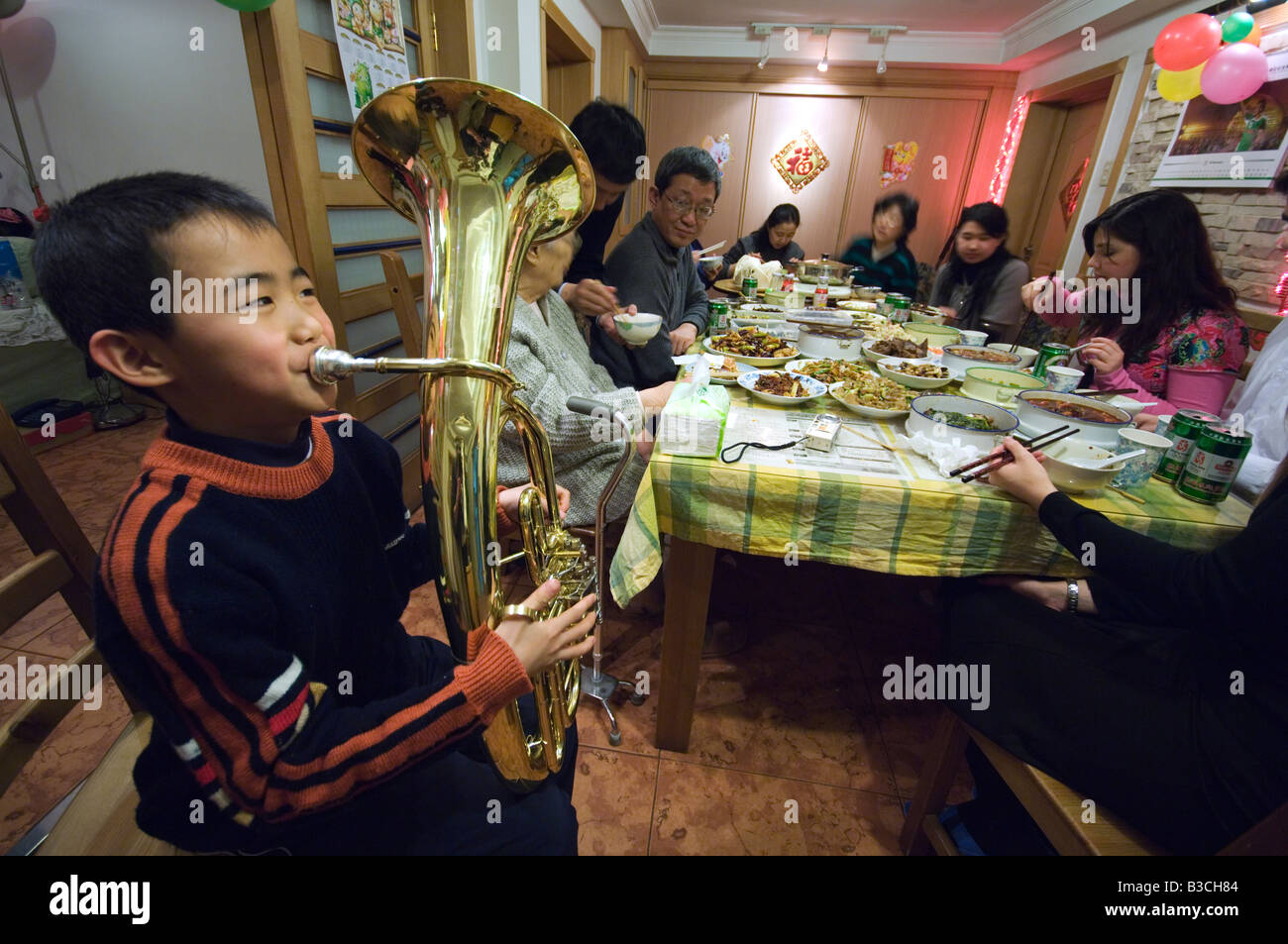 China, Beijing. Chinese New Year Spring Festival family dinner ...