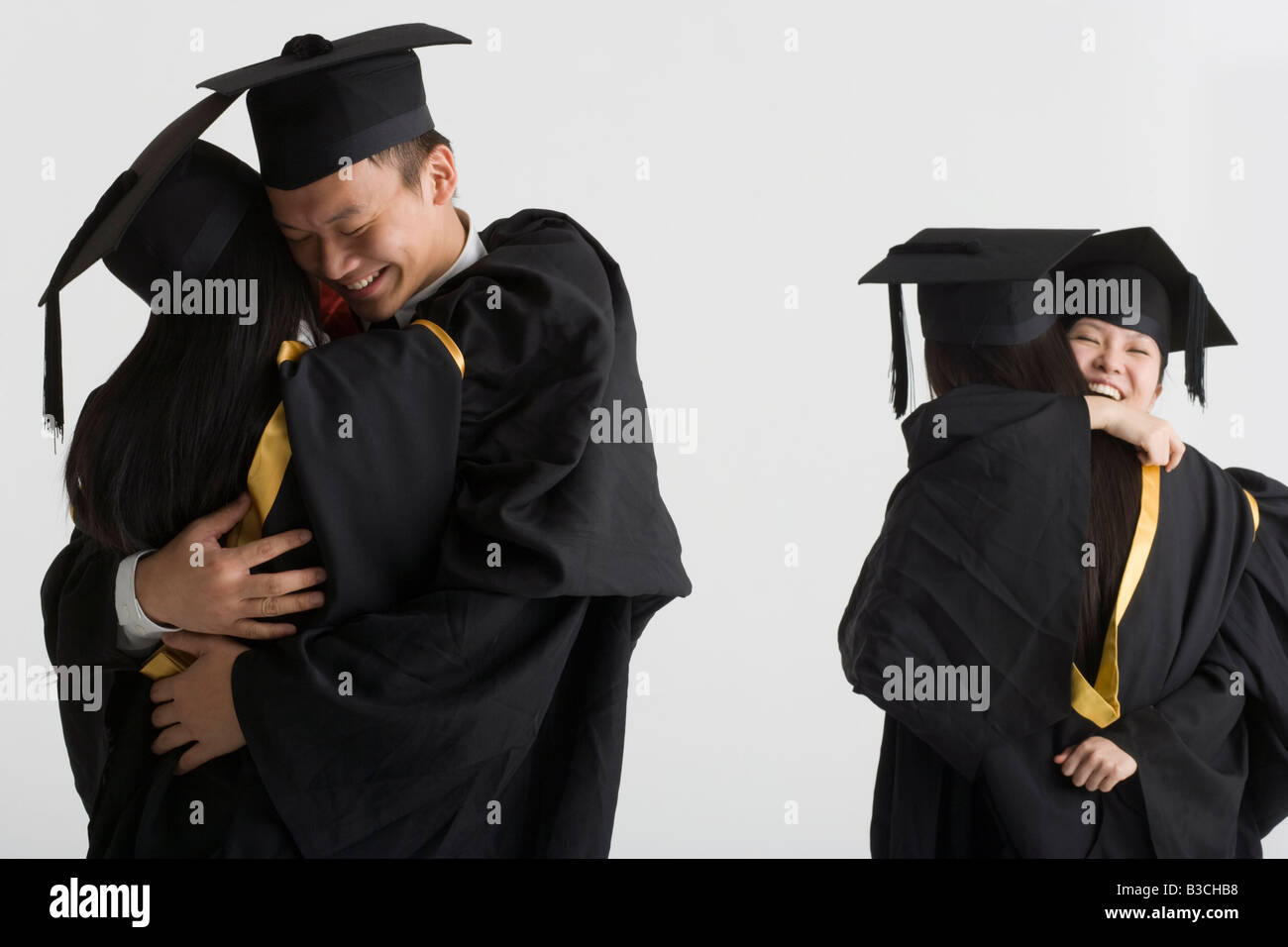 Young male graduate hugging a female graduate and two female graduates ...