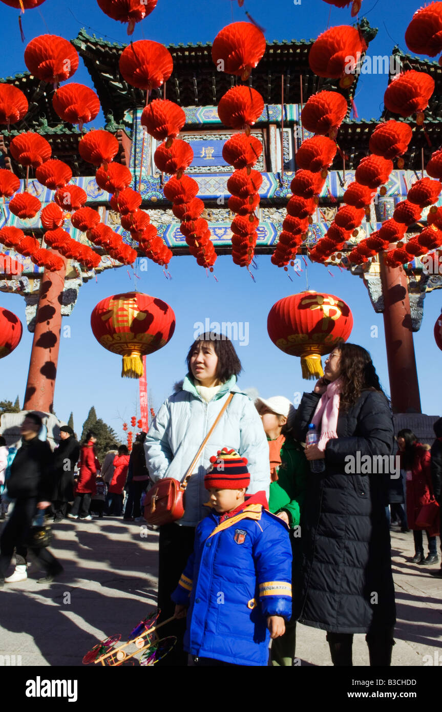 China, Beijing. Chinese New Year Spring Festival - A family under red ...