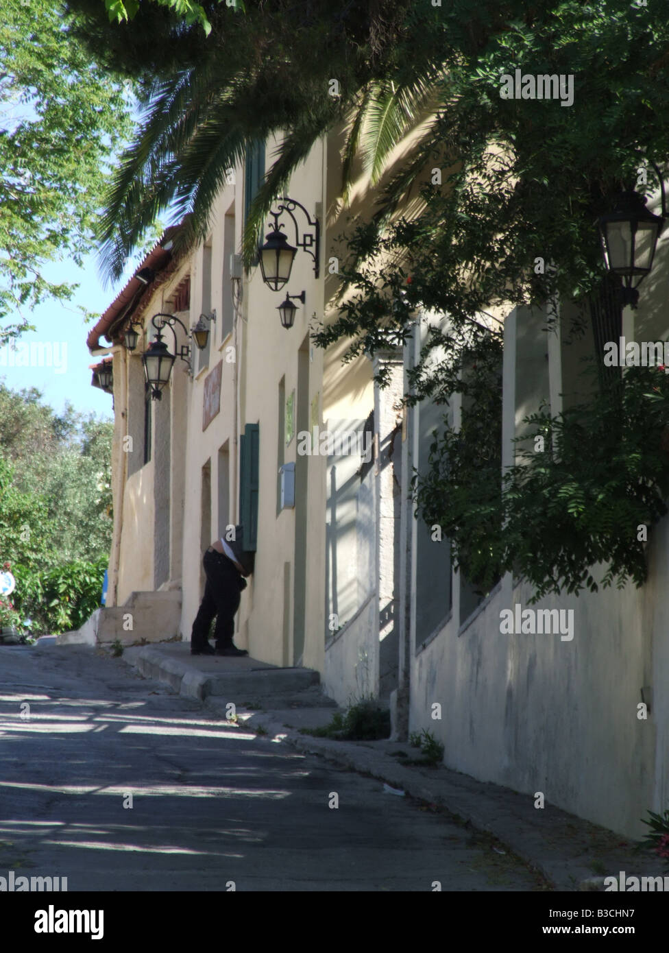typical street scene in athens greece Stock Photo - Alamy