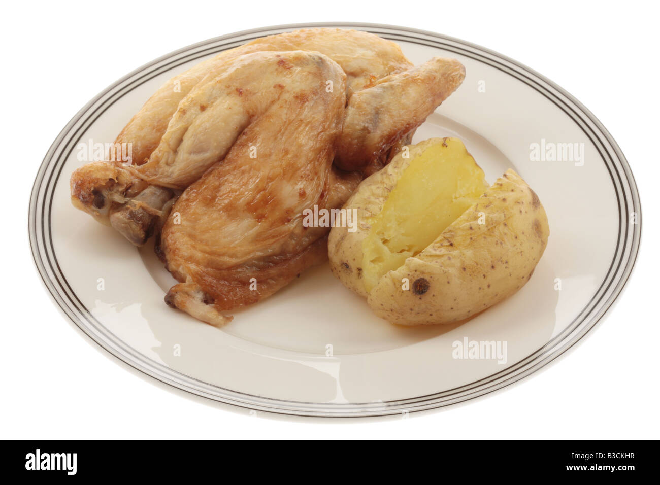 Half A Spit Roast Chicken with Jacket Potato Stock Photo - Alamy