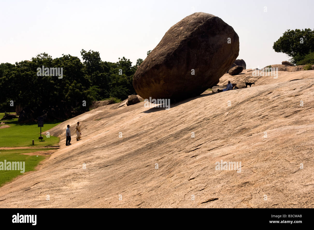 Immovable rock at Mahabalipuram, Madras, India, provides shade Stock ...