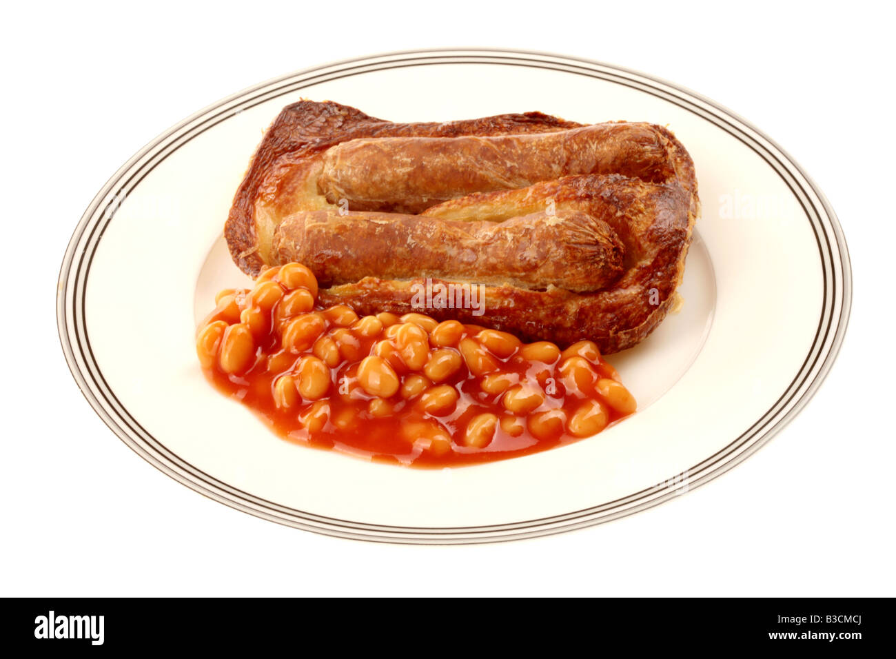 Fresh Pork Sausage Toad In The Hole With Baked Beans Meal Isolated ...