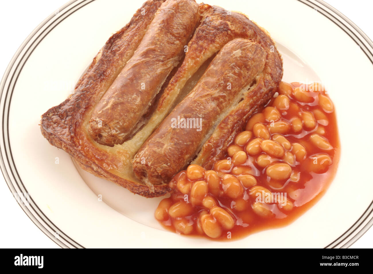 Fresh Pork Sausage Toad In The Hole With Baked Beans Meal Isolated ...
