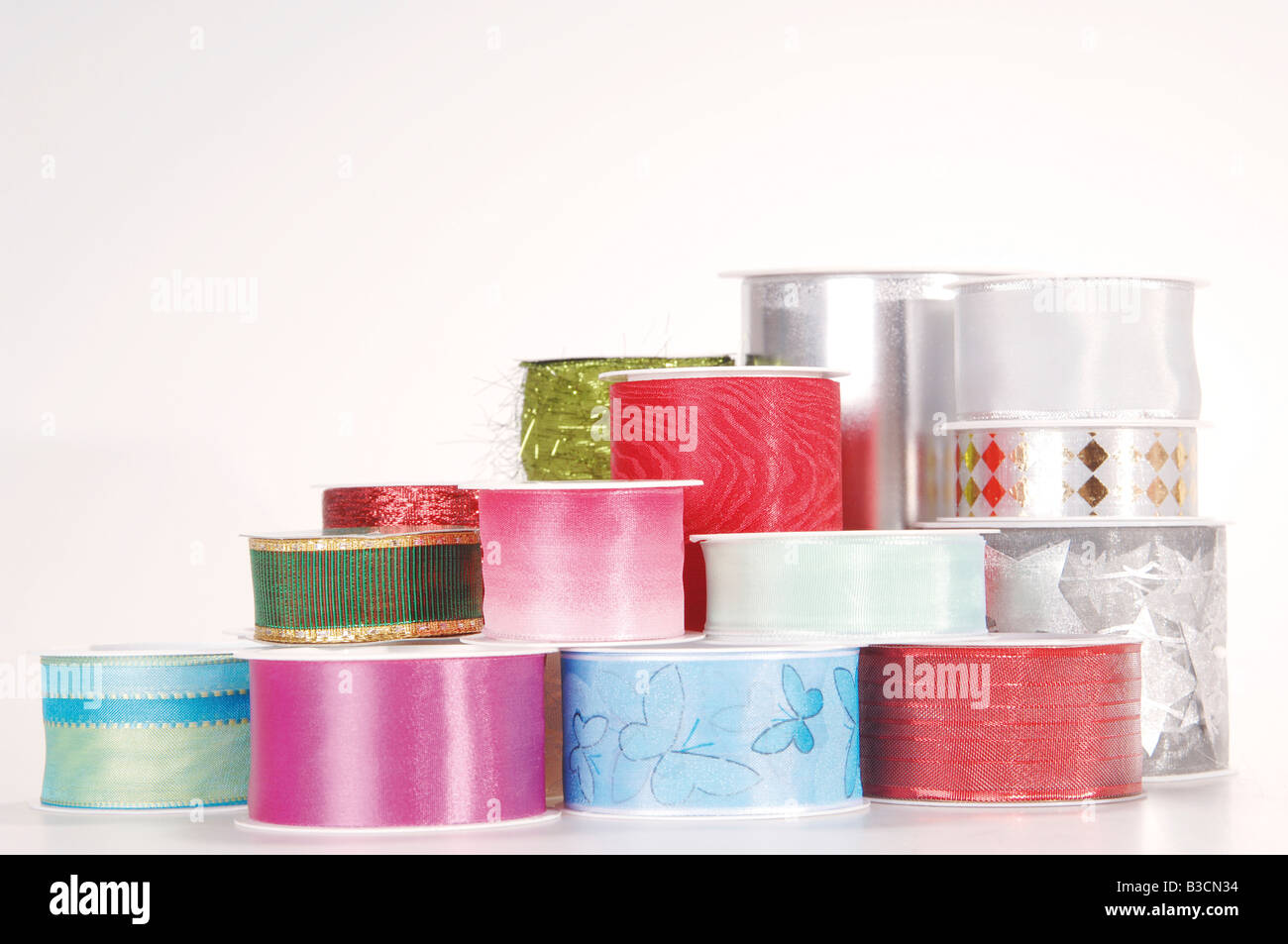 Rolls of ribbon, stacked Stock Photo - Alamy