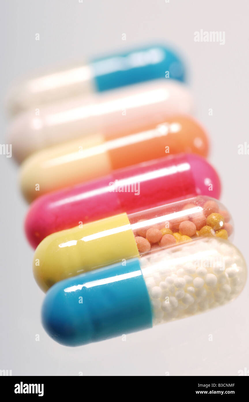 Capsules in a row Stock Photo - Alamy