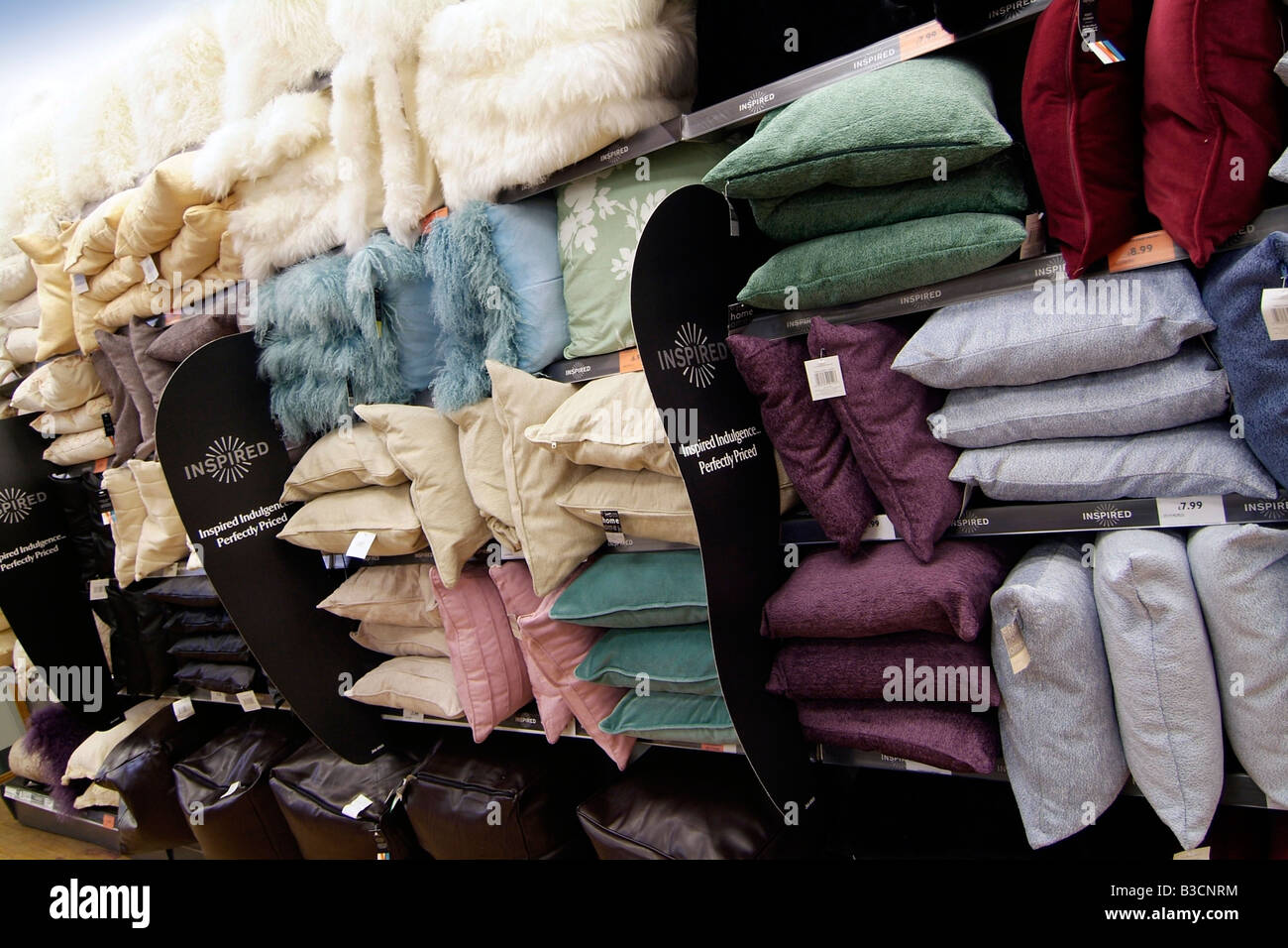 Cushion display in a high street soft furnishing retail store Stock ...
