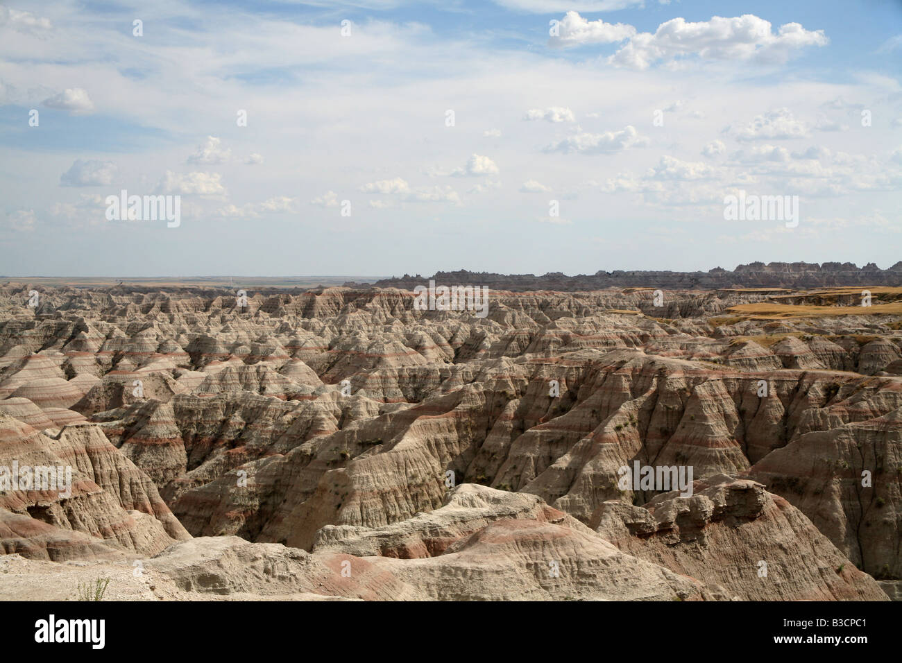A view of The Badlands South Dakota in summer showing a stark landscape ...
