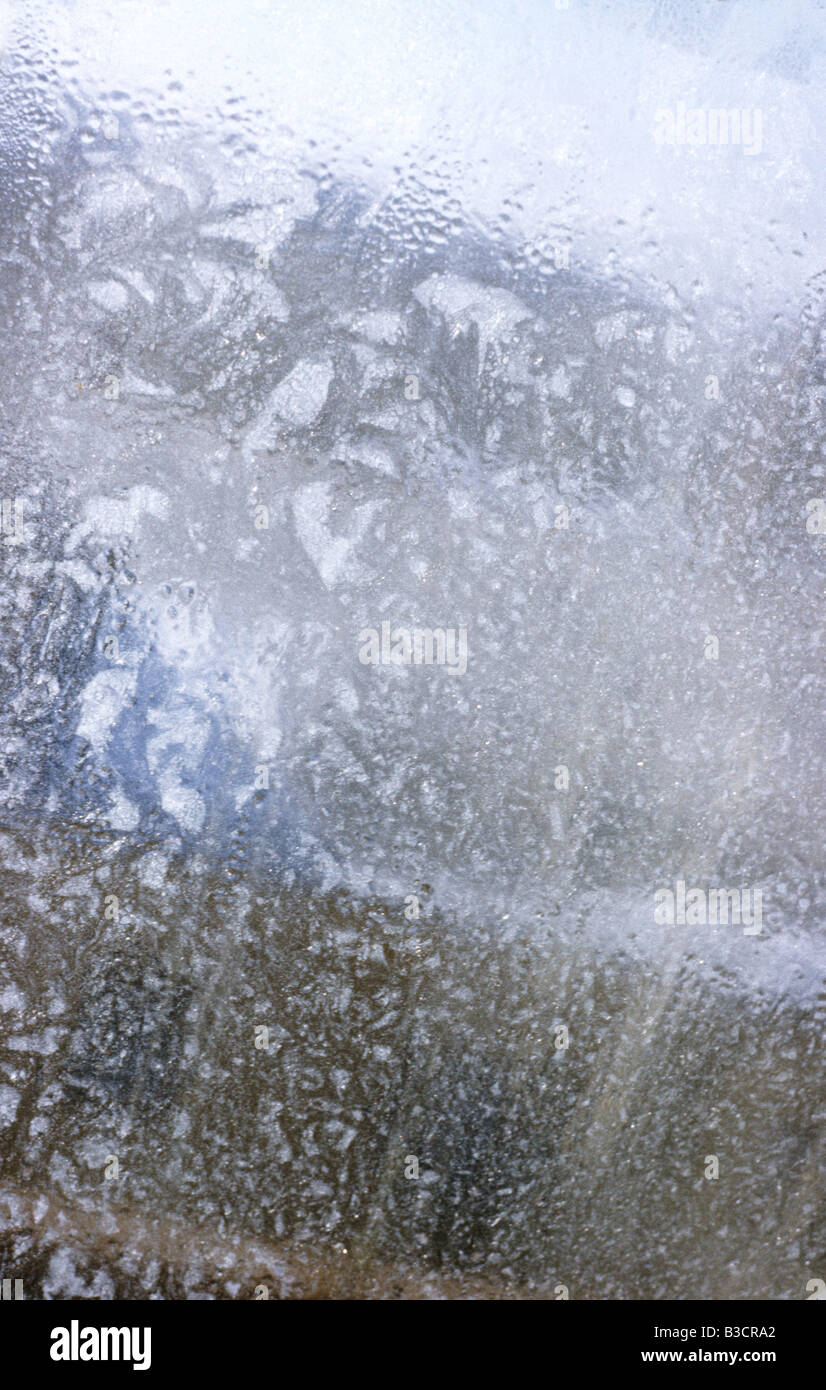 Hoar frost on the window glass Stock Photo - Alamy