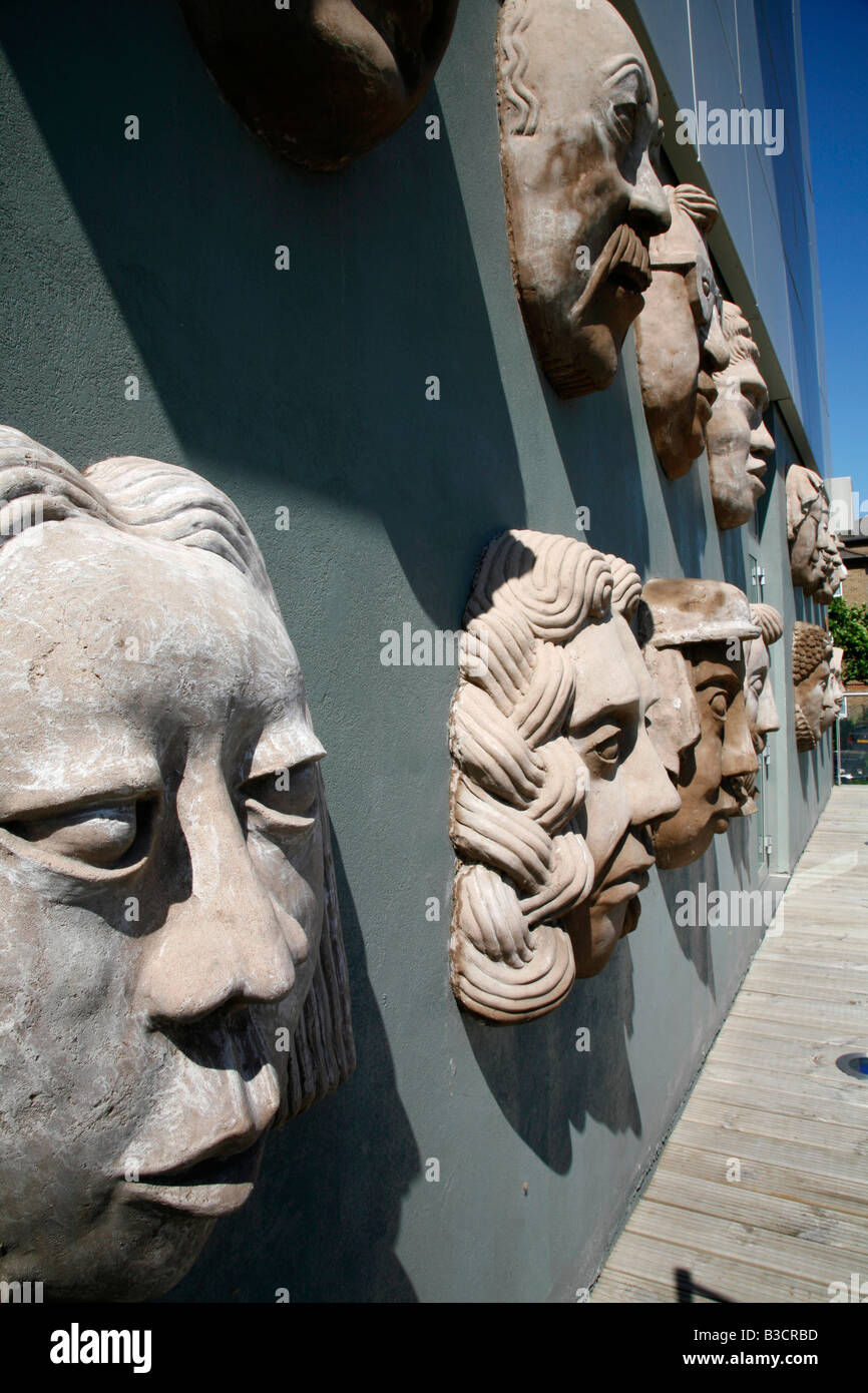Wall of the Ancestors sculpture on the Aragon Tower, Deptford, London ...