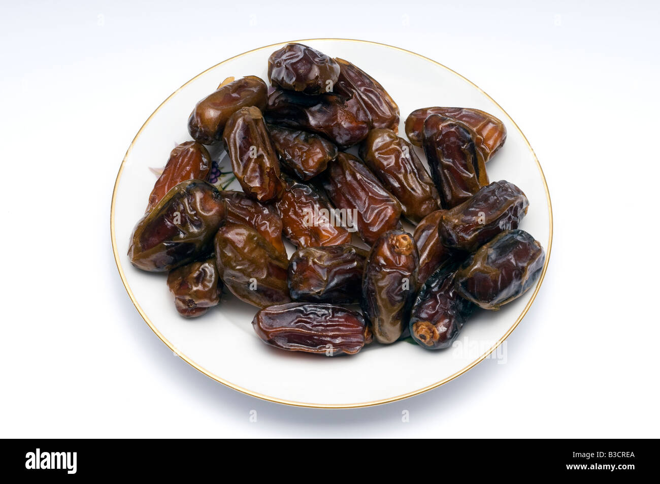 pile of Halawi dates on a plate Stock Photo - Alamy