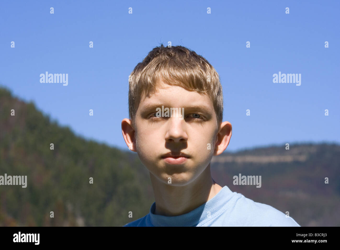 teenager portrait - boy with a skeptic look Stock Photo - Alamy