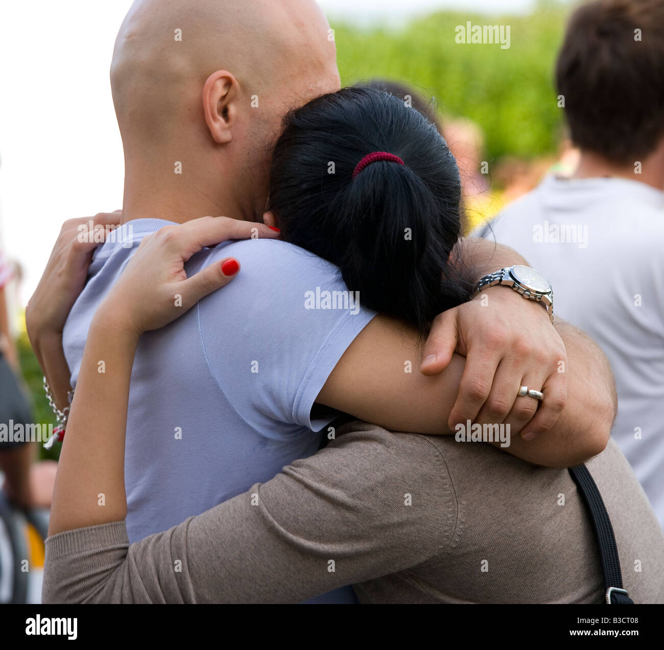 Intertwined arms hi-res stock photography and images - Alamy