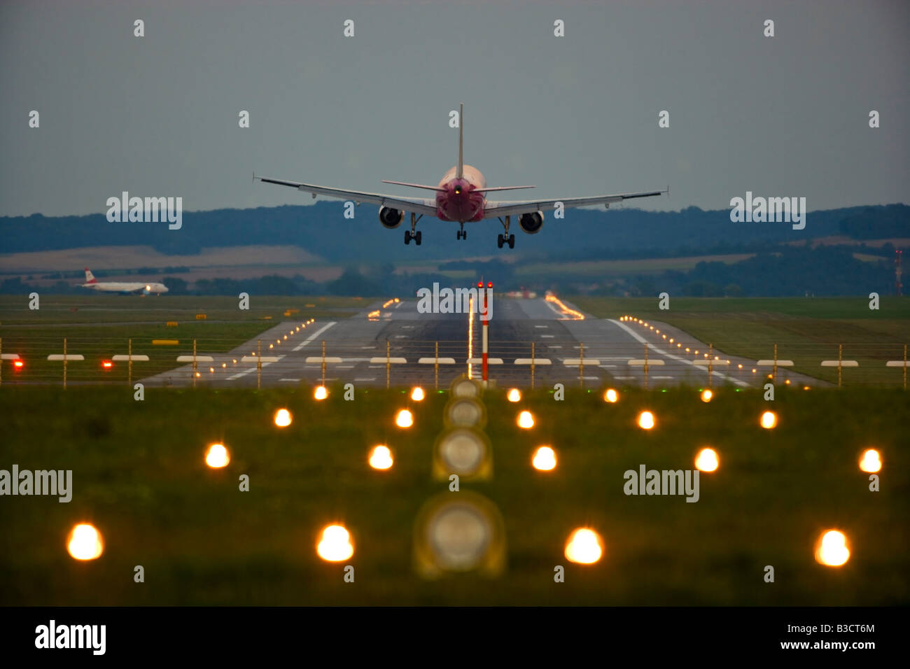 Landing aircraft on final approach Stock Photo - Alamy