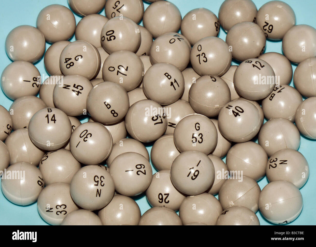 BINGO BALLS ARE DRAWN AT RANDOM FROM A ROTATING CAGE TO PREVENT THE ...