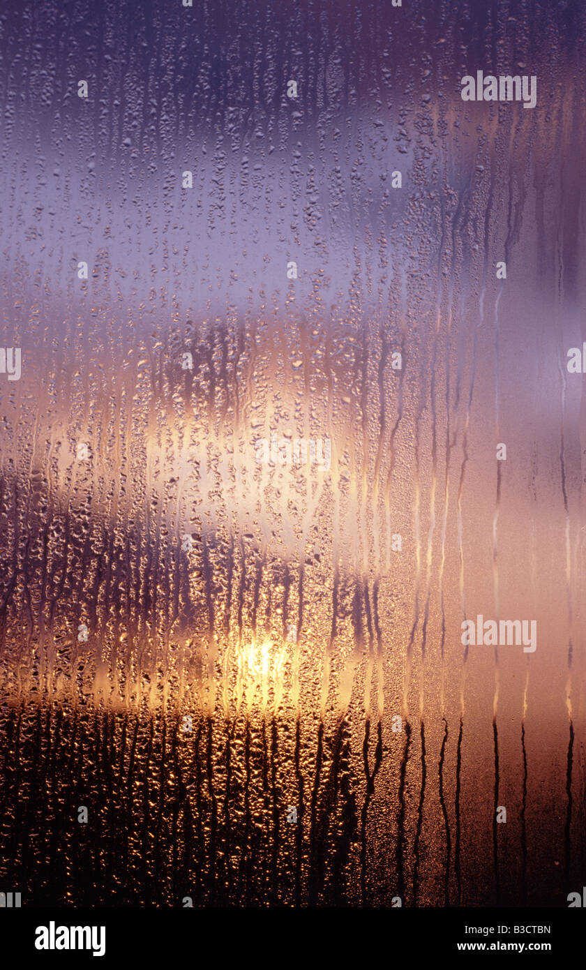Rain drops on the window glass on sunset Stock Photo - Alamy
