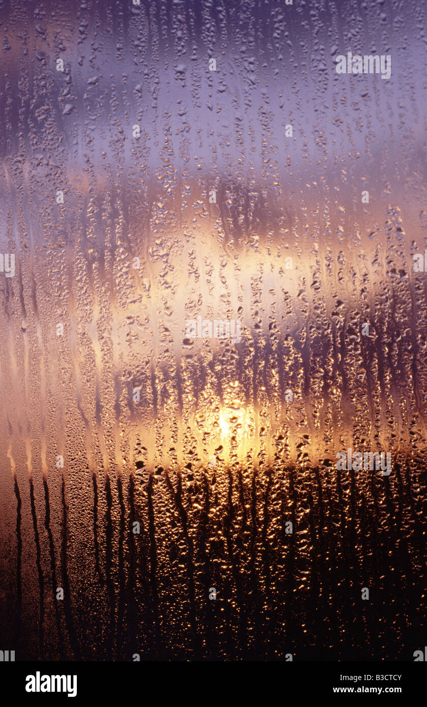 Rain drops on the window glass on sunset Stock Photo - Alamy