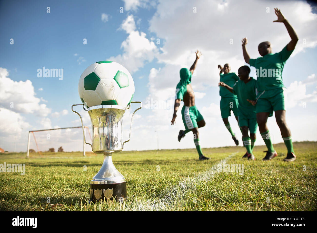 Team celebrating victory hi-res stock photography and images - Alamy