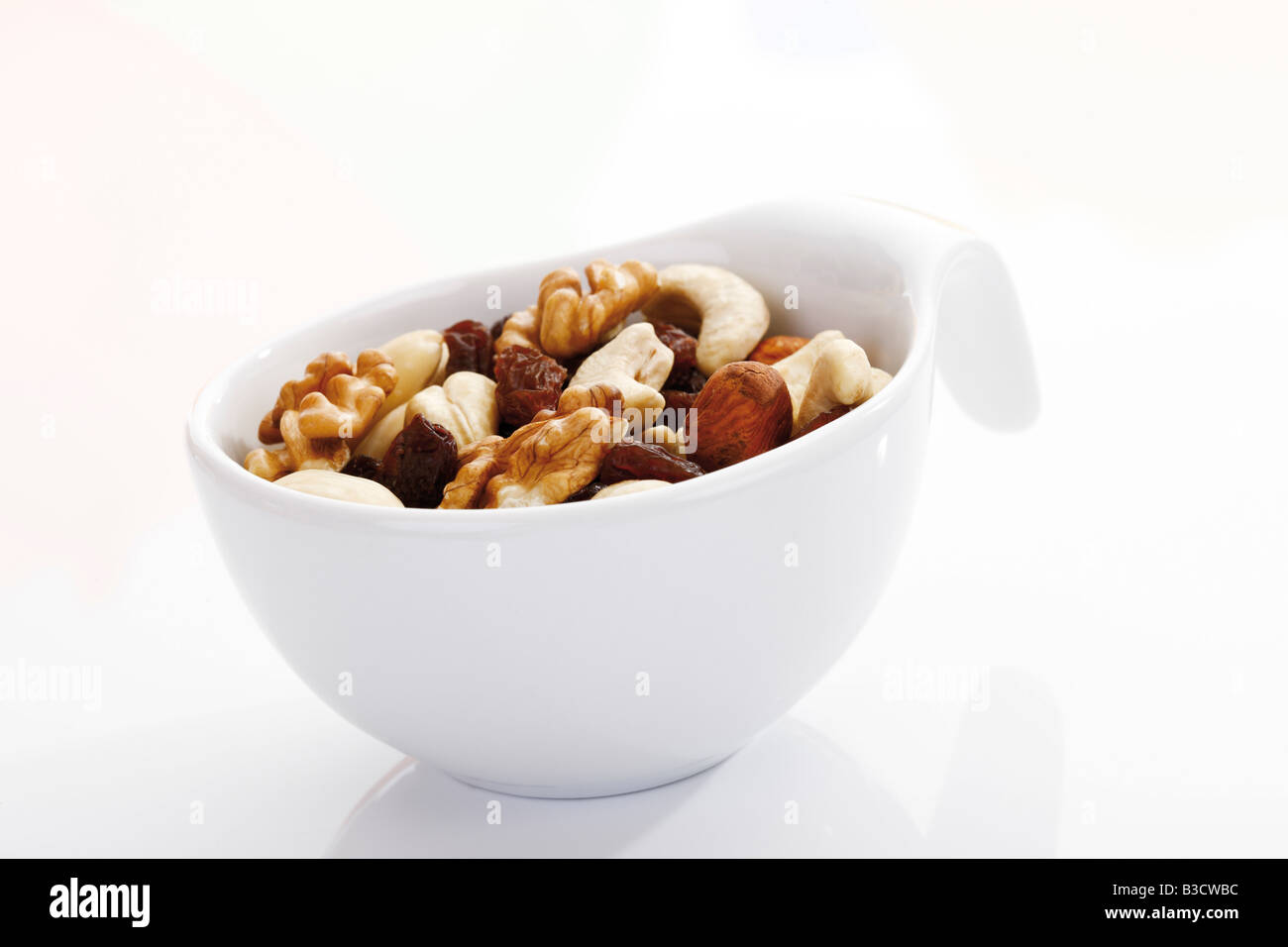 Trail mix in plastic cup, close-up Stock Photo - Alamy
