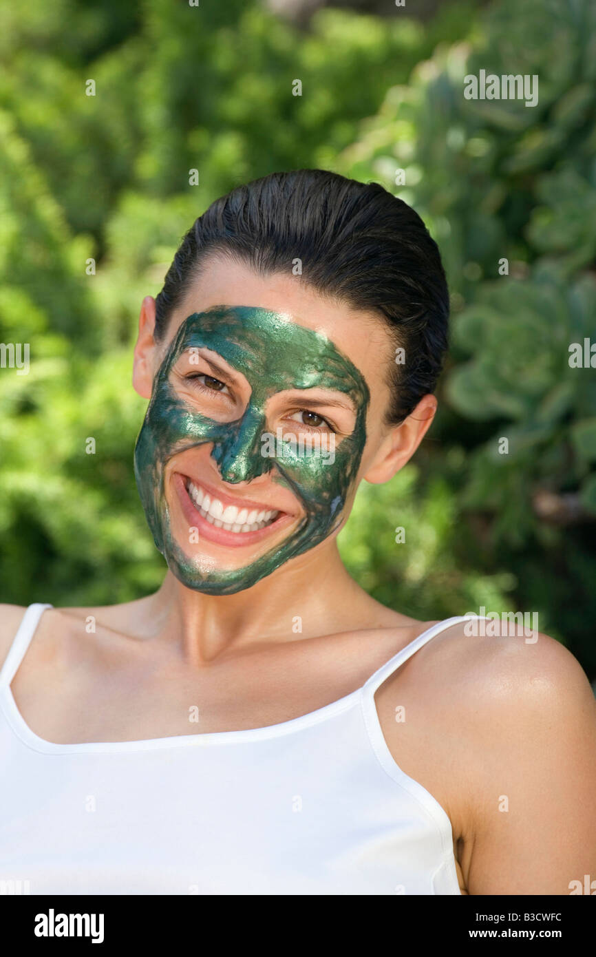 Young woman with face mask, portrait Stock Photo - Alamy