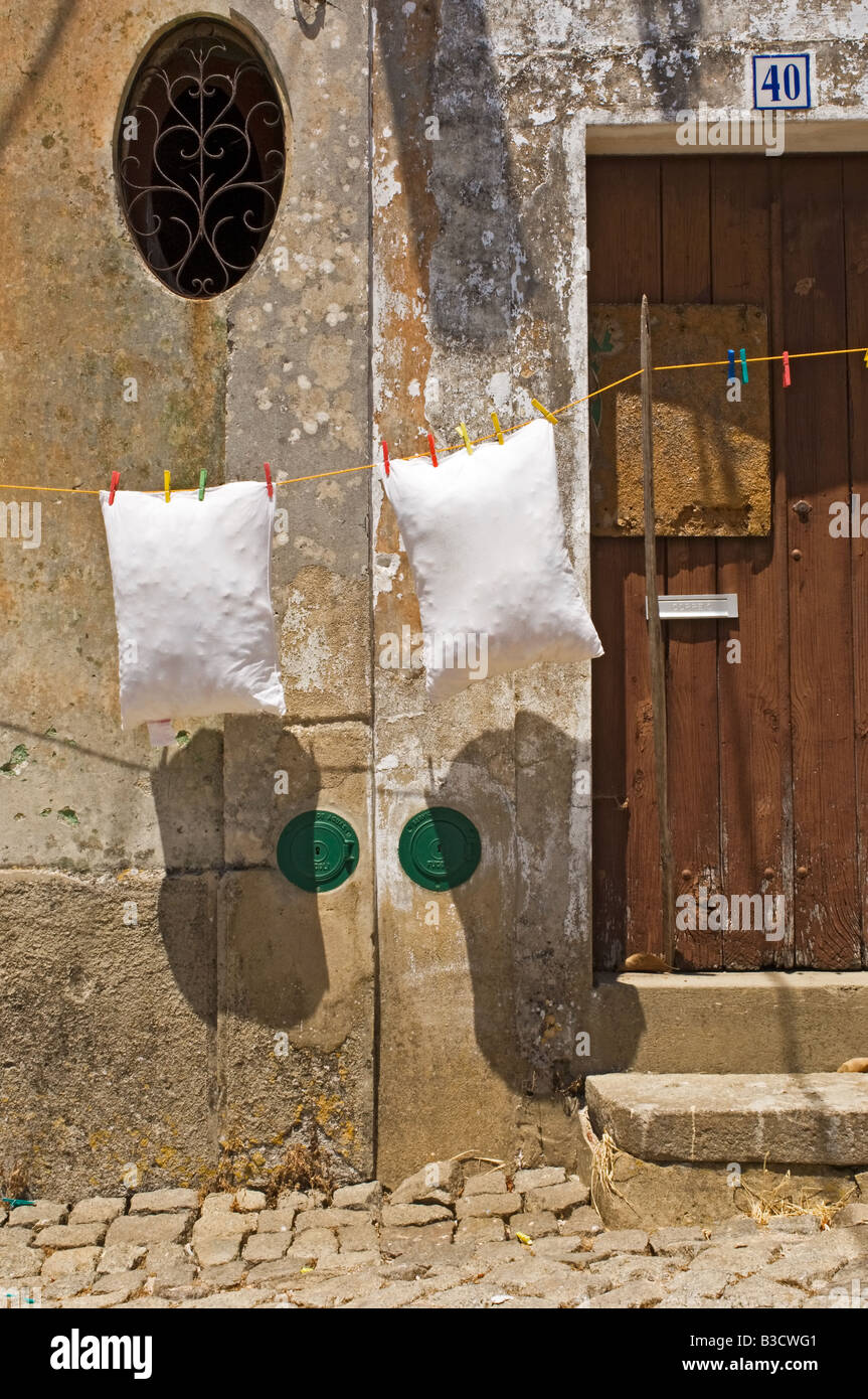 washing line with pillows Monchique, Algarve, Portugal Stock Photo - Alamy