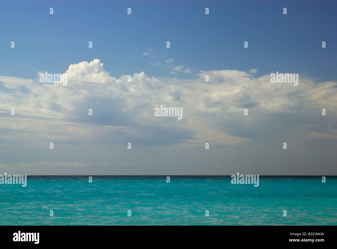 Blue sky with clouds over azure sea Stock Photo - Alamy