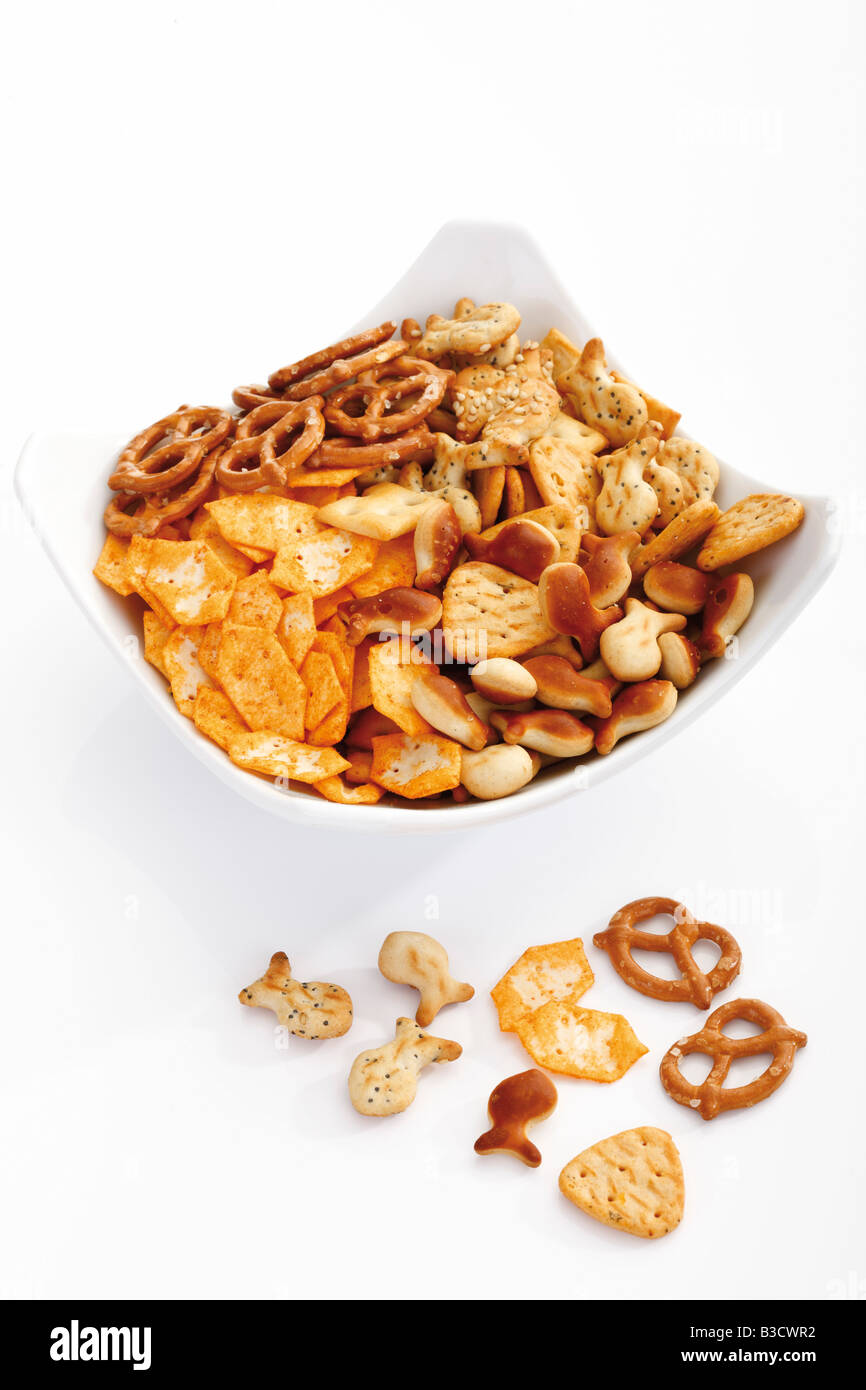 Assorted snacks in bowl, elevated view Stock Photo - Alamy