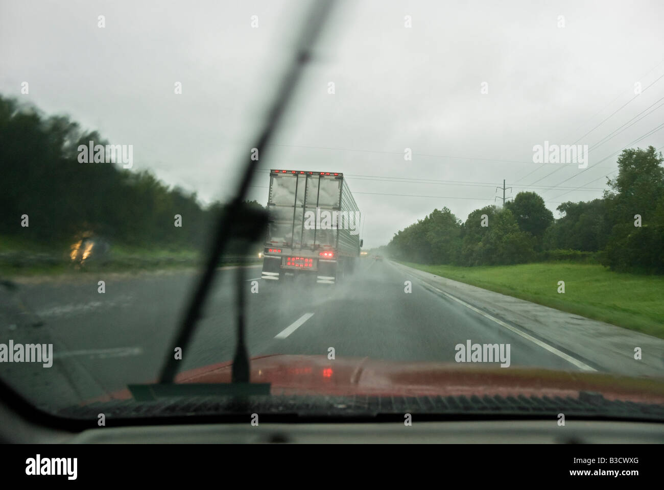 driving through rain from Tropical Storm Fay along Interstate 75 ...