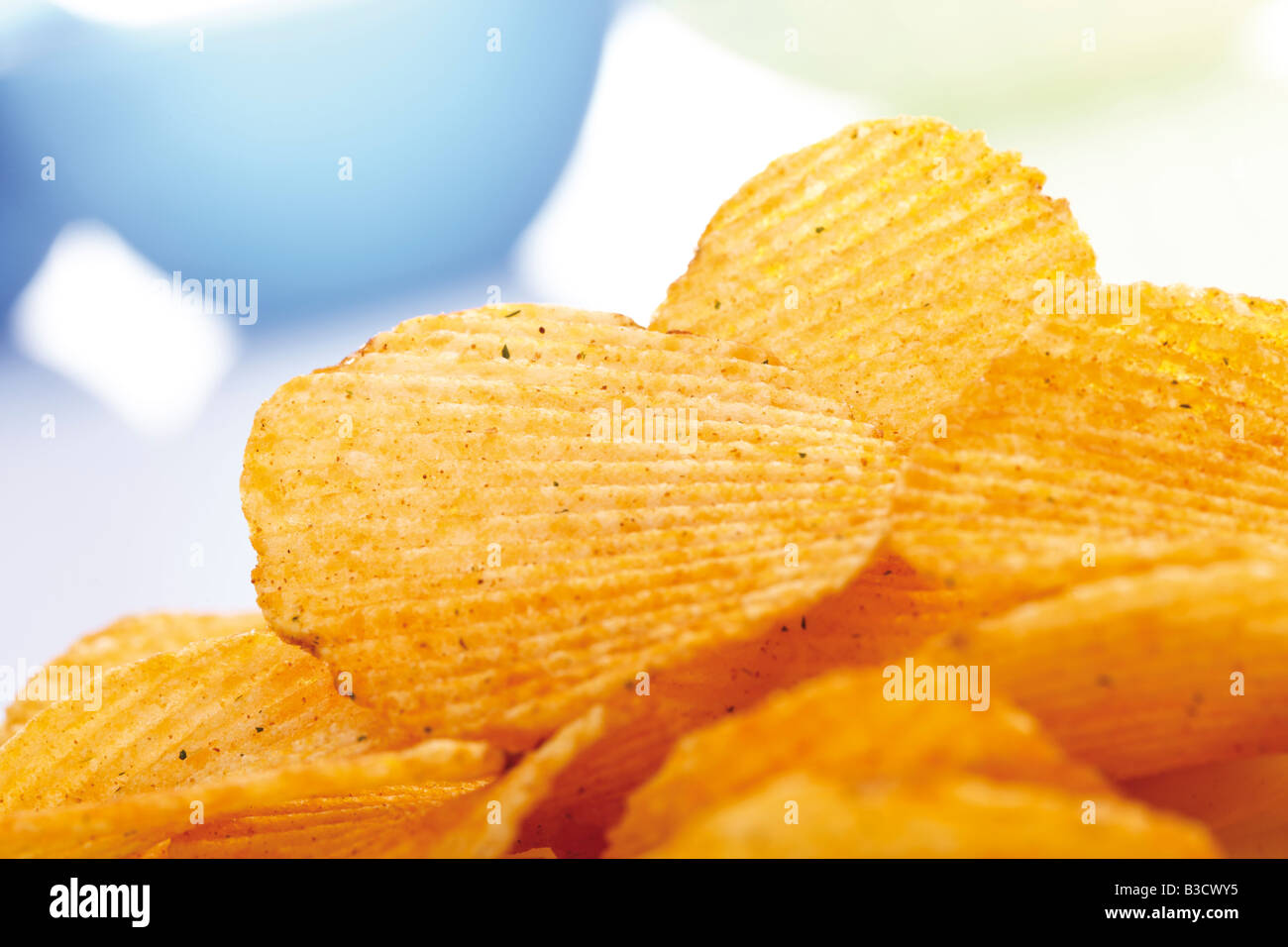Potato chili chips, close-up Stock Photo - Alamy
