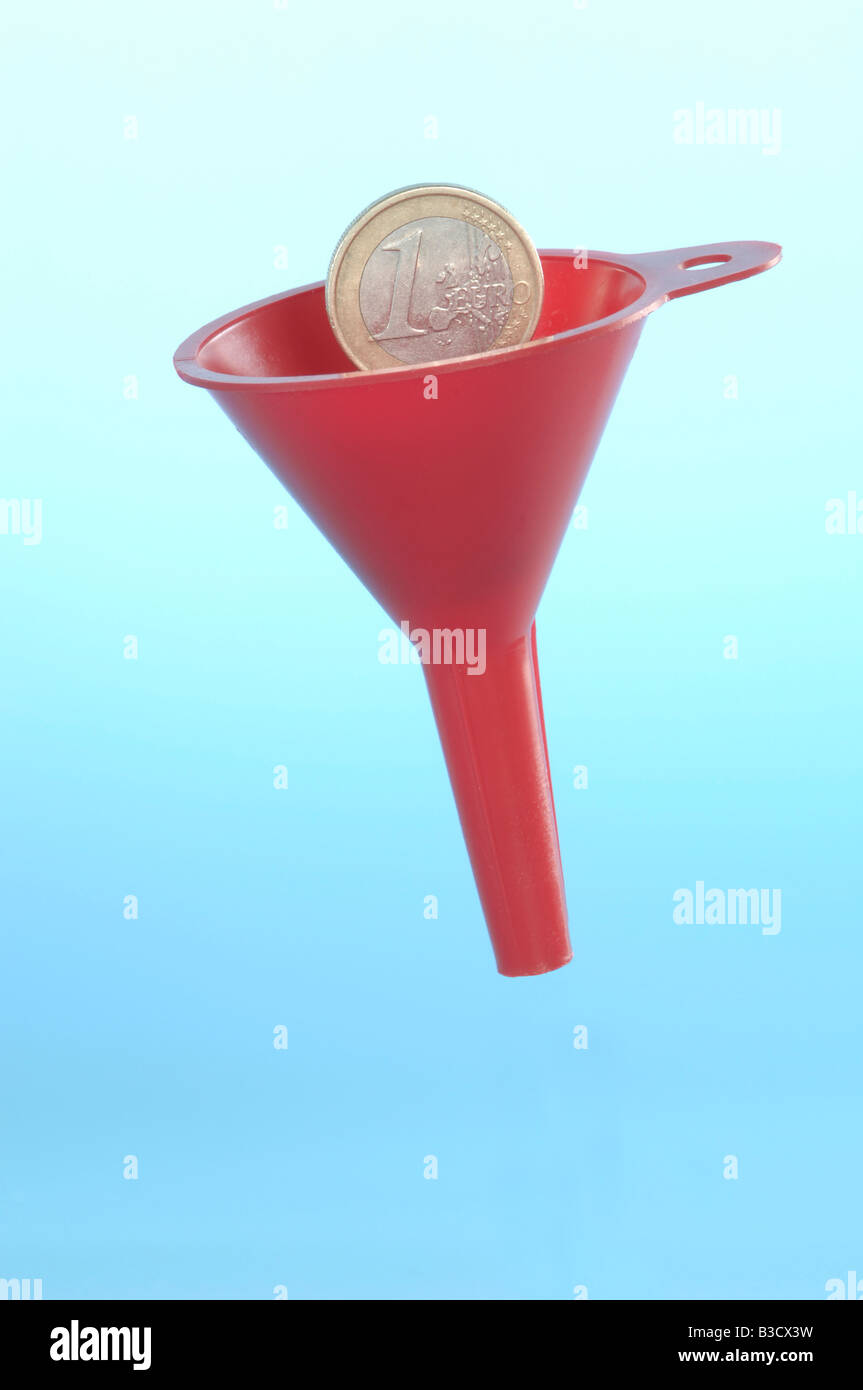 One Euro coin going through funnel Stock Photo - Alamy