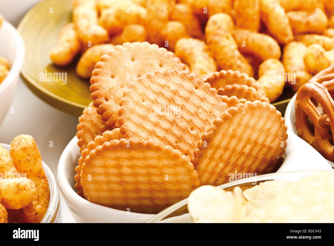 Assorted snacks, Cracker in bowl, elevated view Stock Photo - Alamy