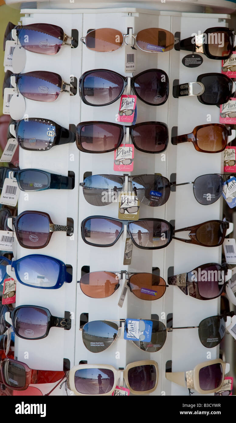 Sunglasses for sale on rack hi-res stock photography and images - Alamy