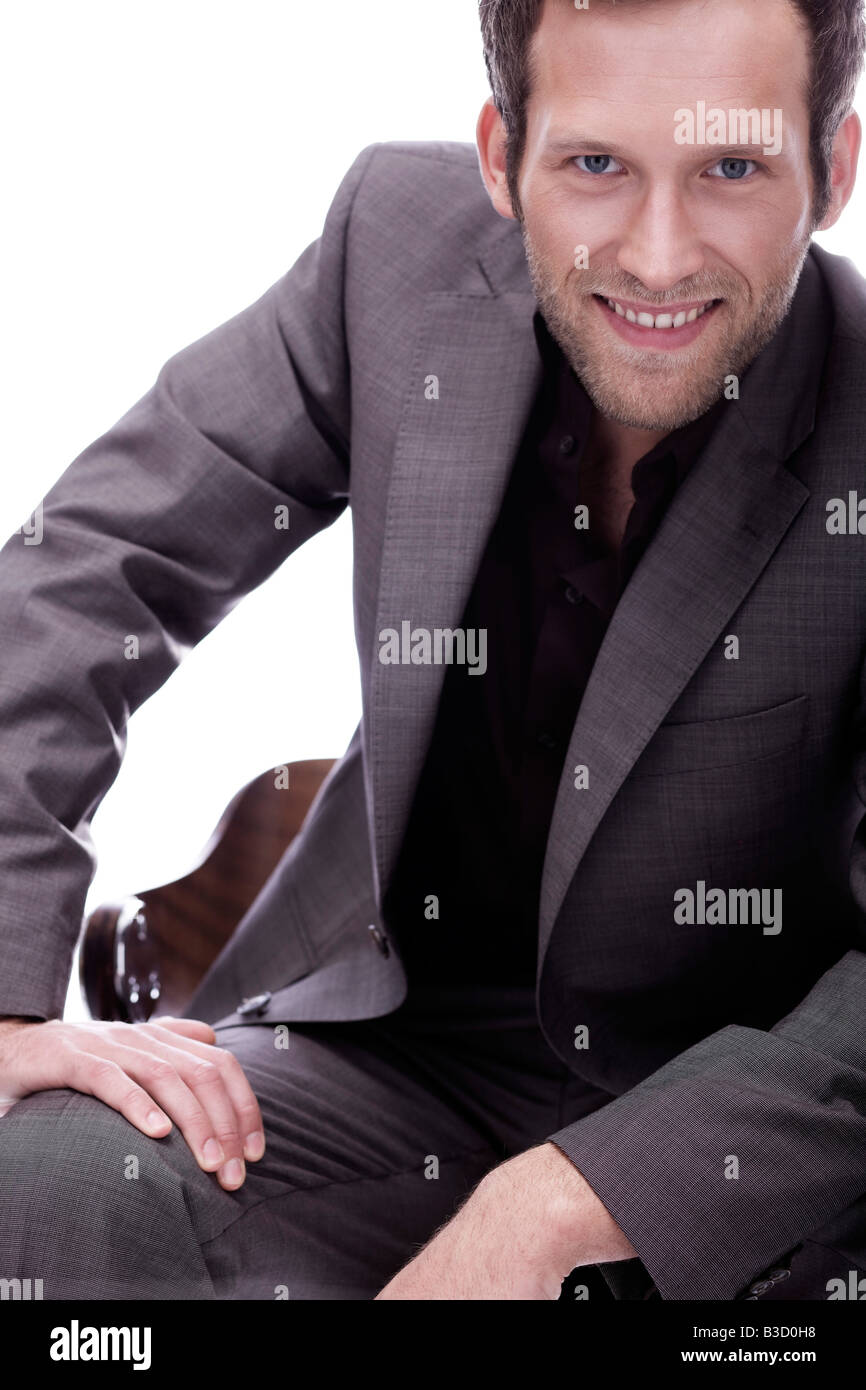 Young man smiling at camera, portrait, close-up Stock Photo - Alamy