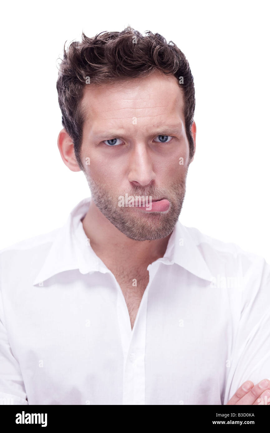 Young man biting lip, portrait, close-up Stock Photo - Alamy