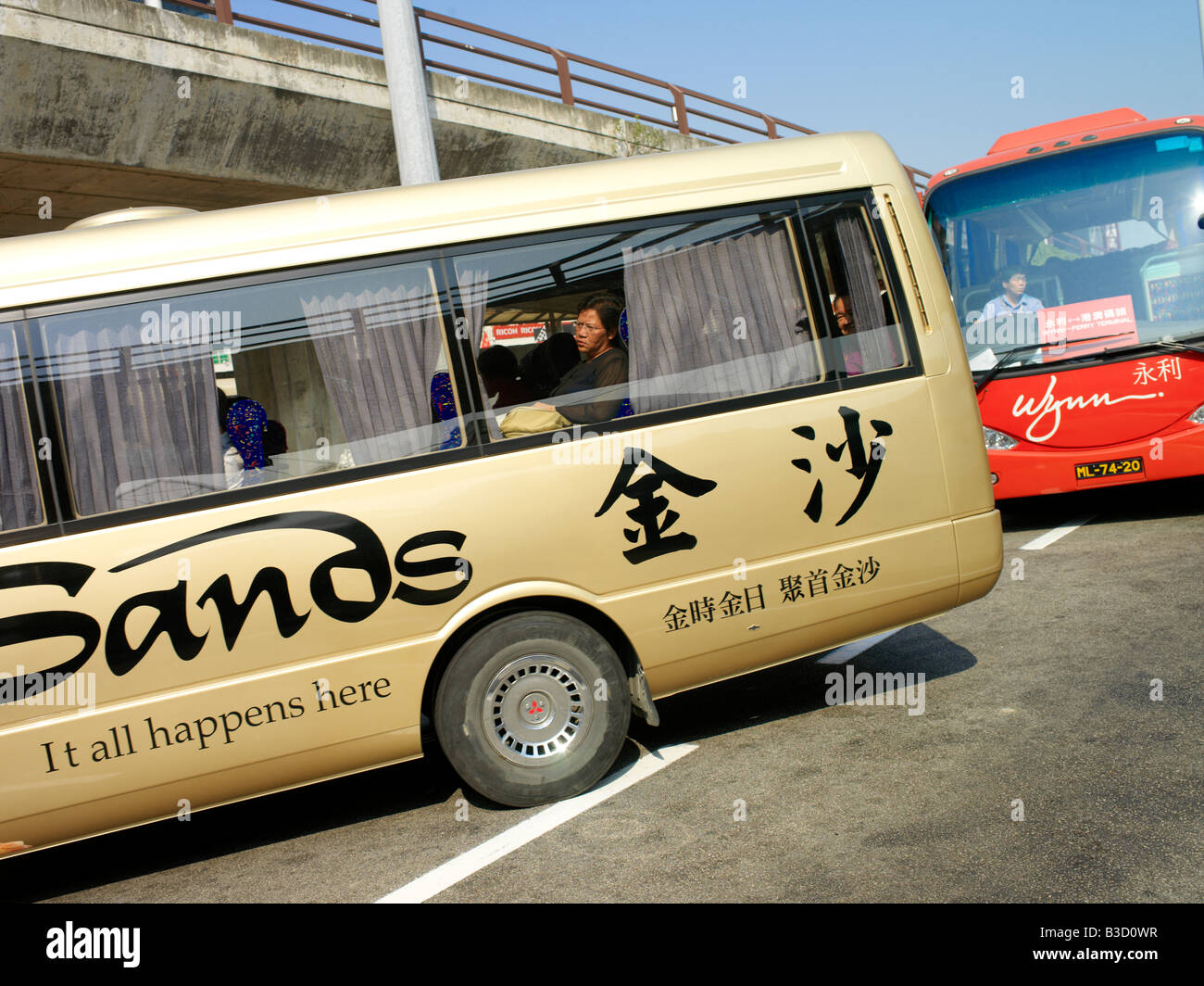 Free shuttle buses collect tourists from the Macau Ferry Terminal and ...