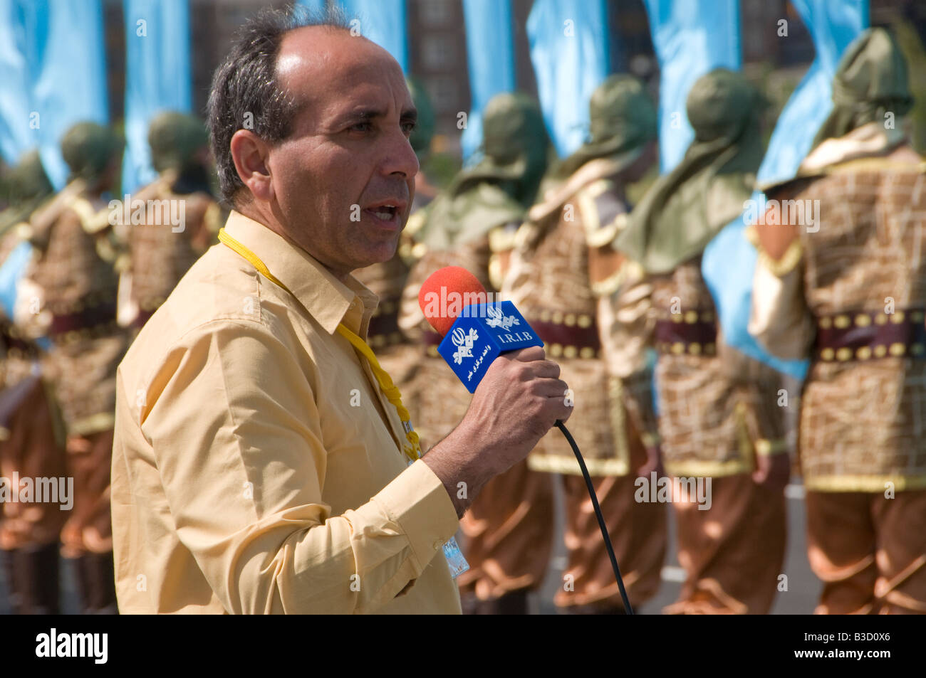 A reporter of the Islamic Republic of Iran IRIB broadcasting live Stock ...