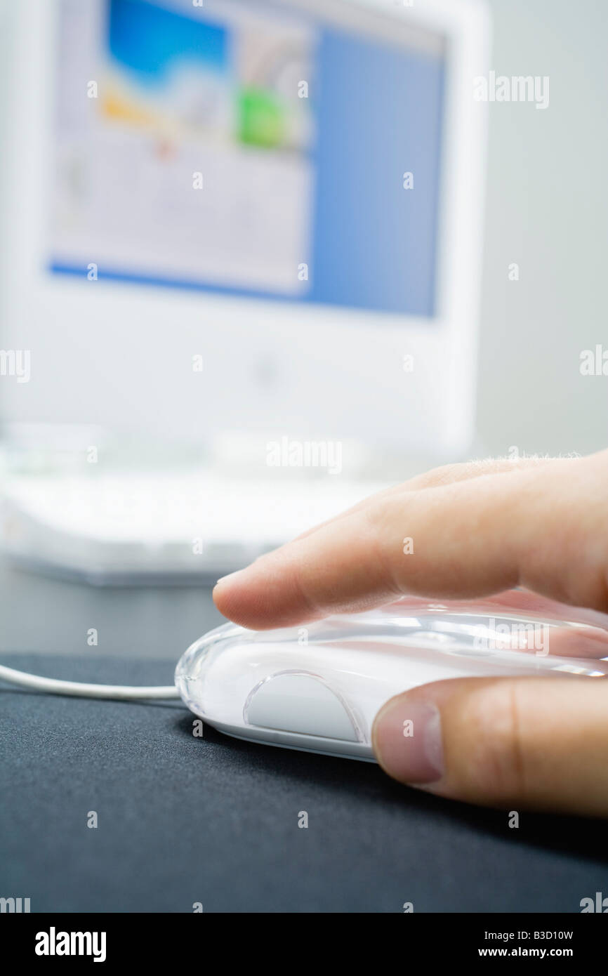 Man using computer mouse, close-up Stock Photo - Alamy