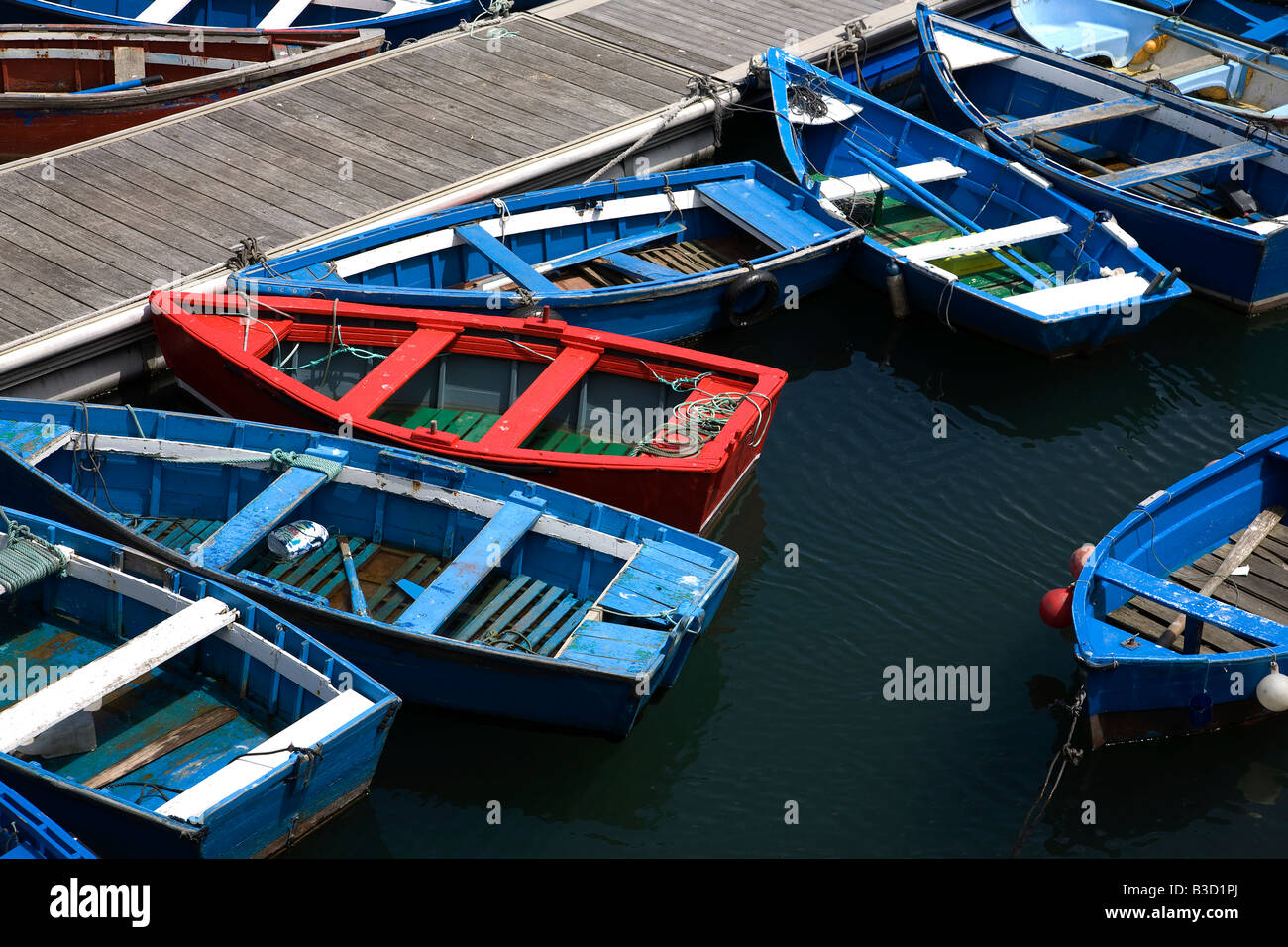 General view of rowing boats in the harbour in the town of Luarca in ...