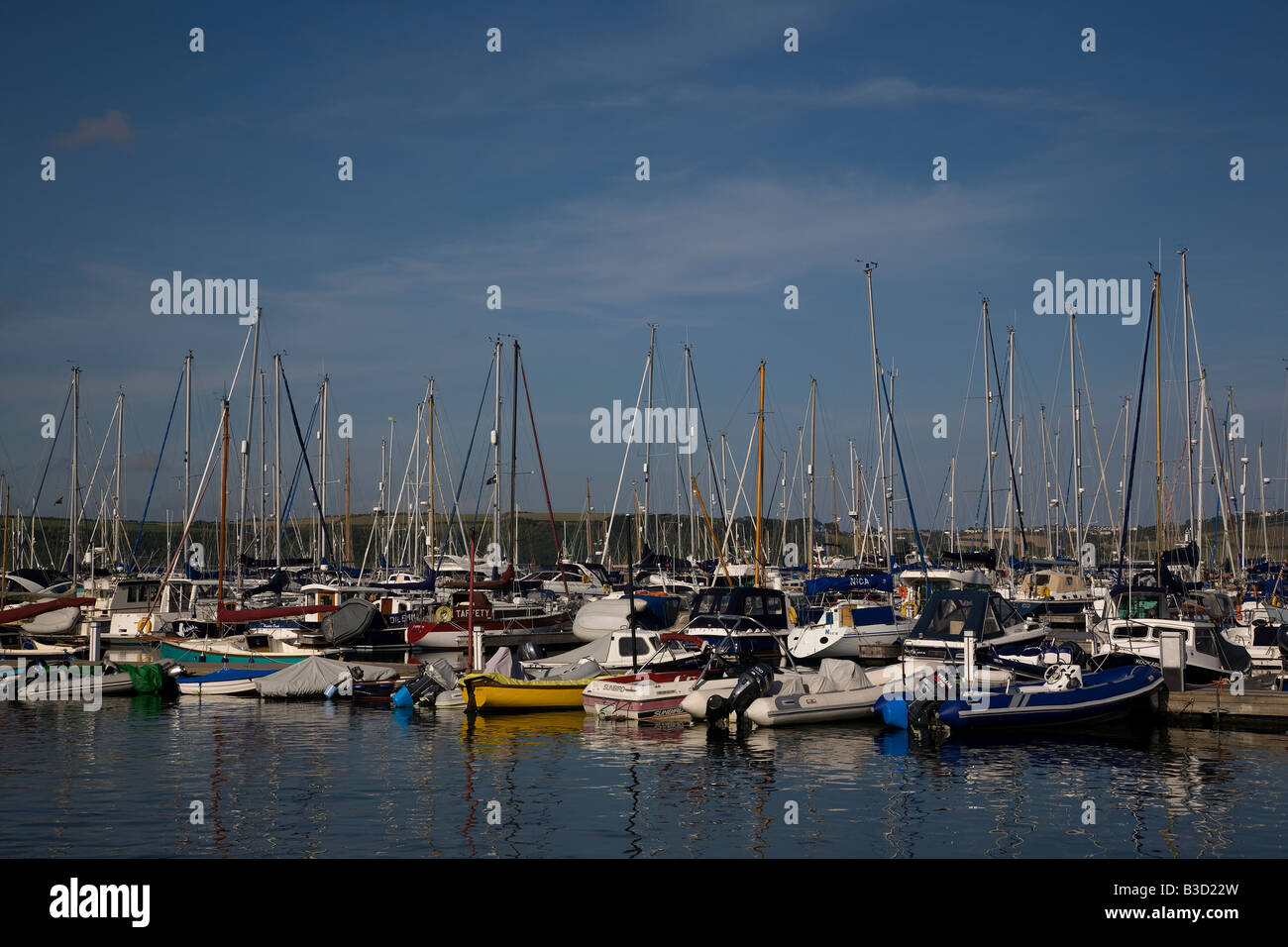 Boats and yachts moored in Mylor Harbour in the Carrick Roads estuary ...