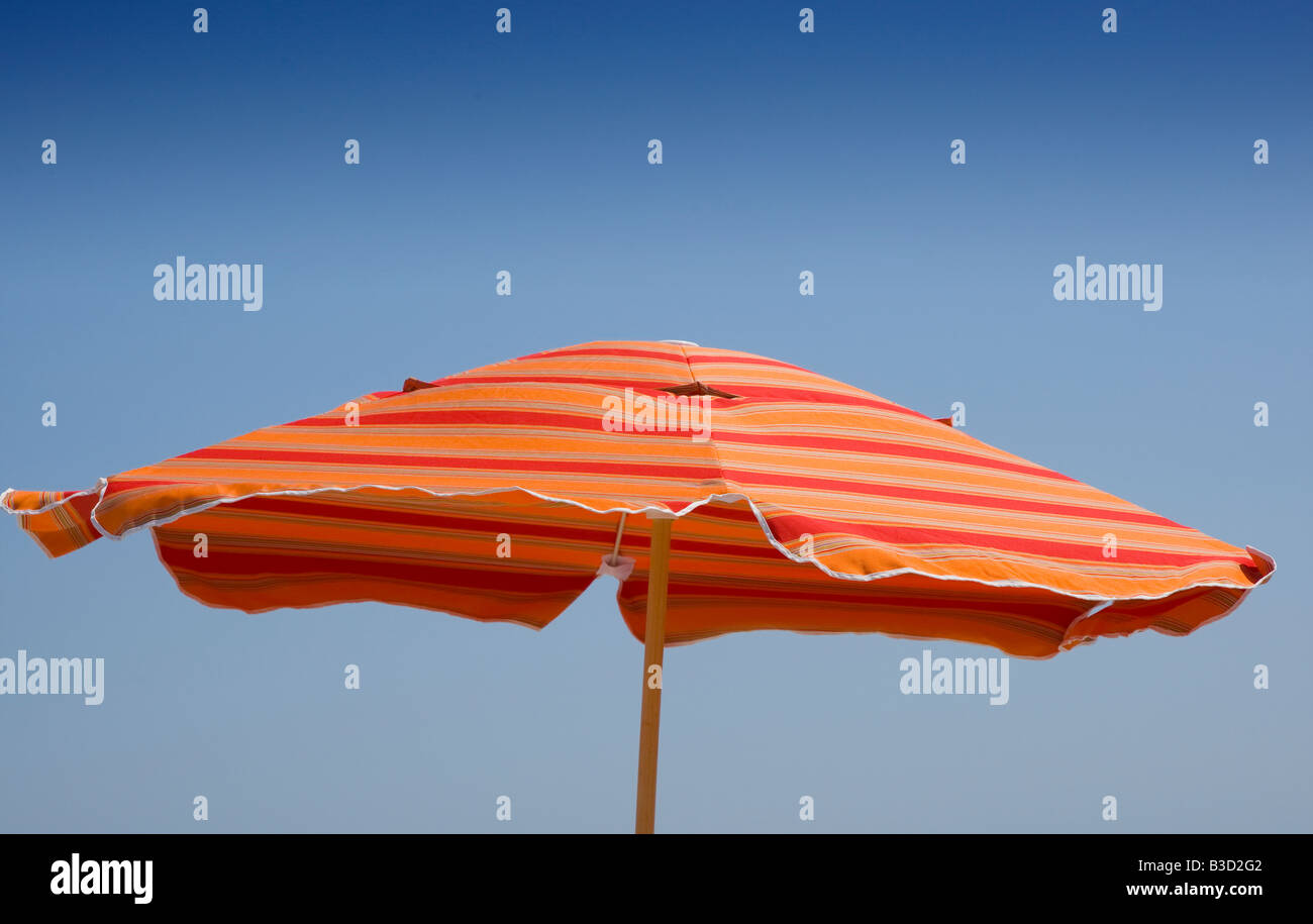 Opened beach umbrella Stock Photo - Alamy