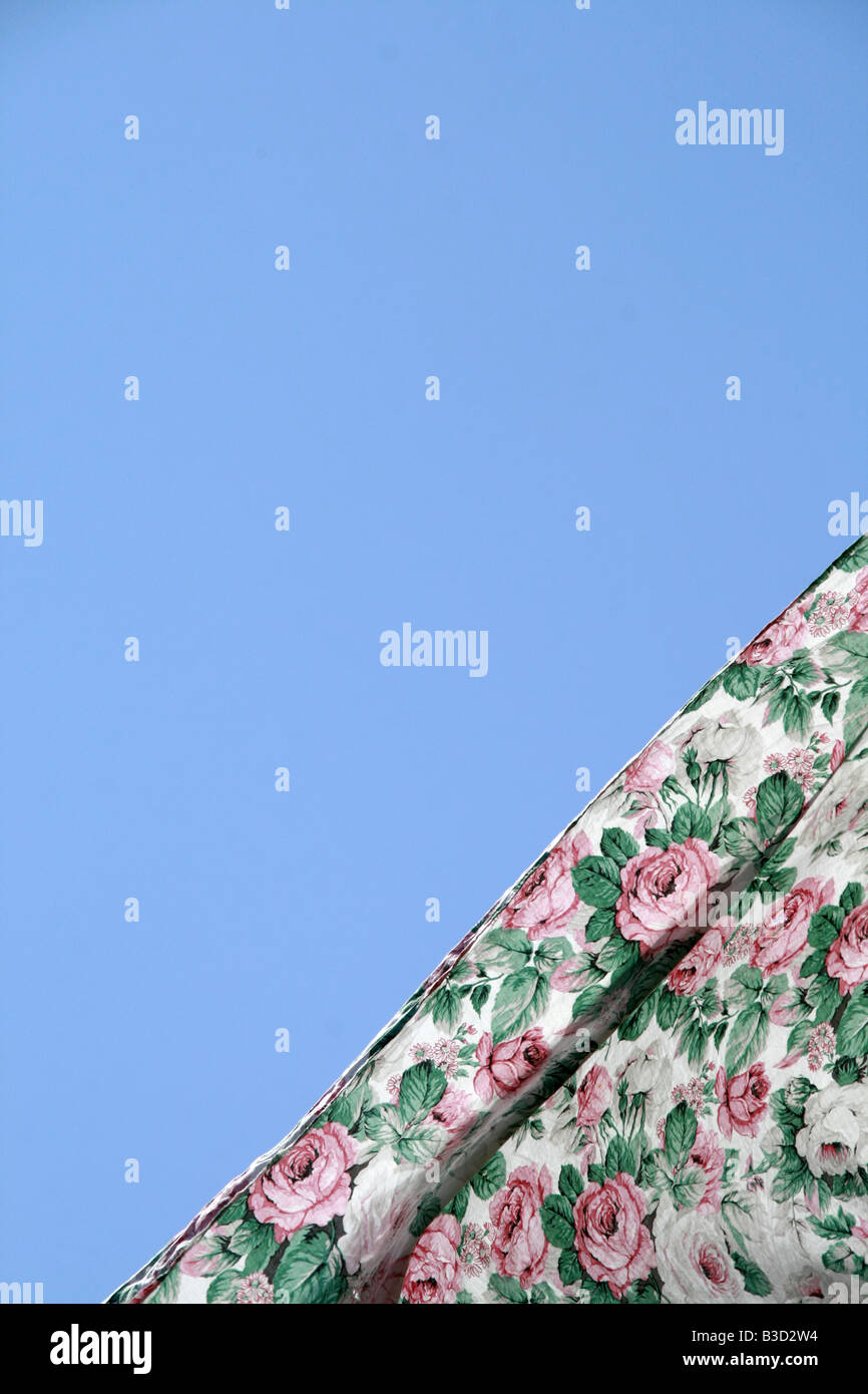 bedding flying in wind on washing line in sun Stock Photo - Alamy