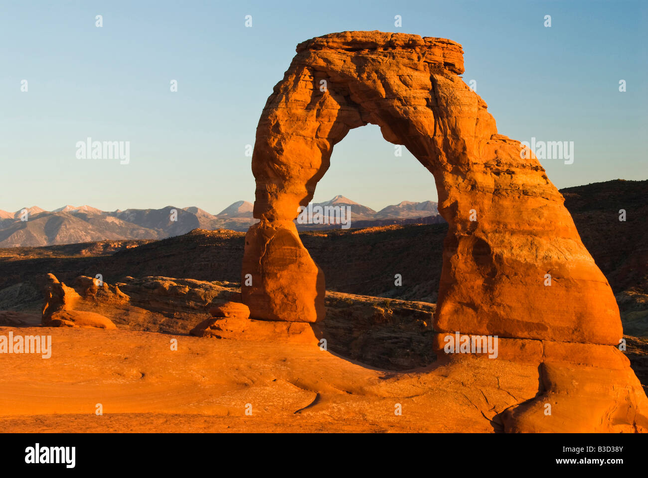 Delicate Arch at sunset Arches National Park Utah Stock Photo - Alamy