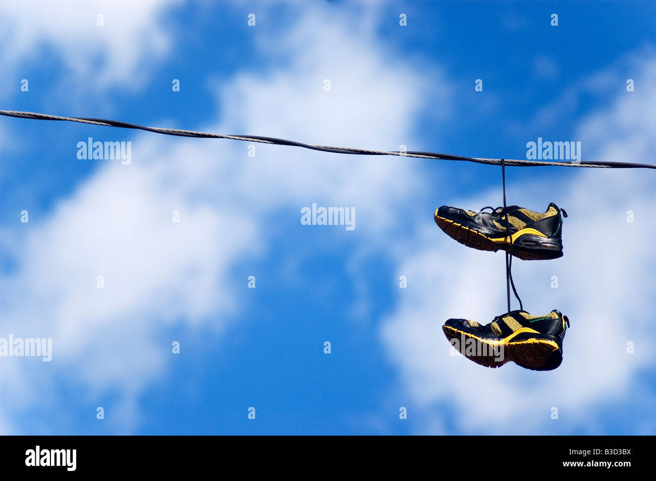 Shoes Hanging From Cable High Resolution Stock Photography and Images ...