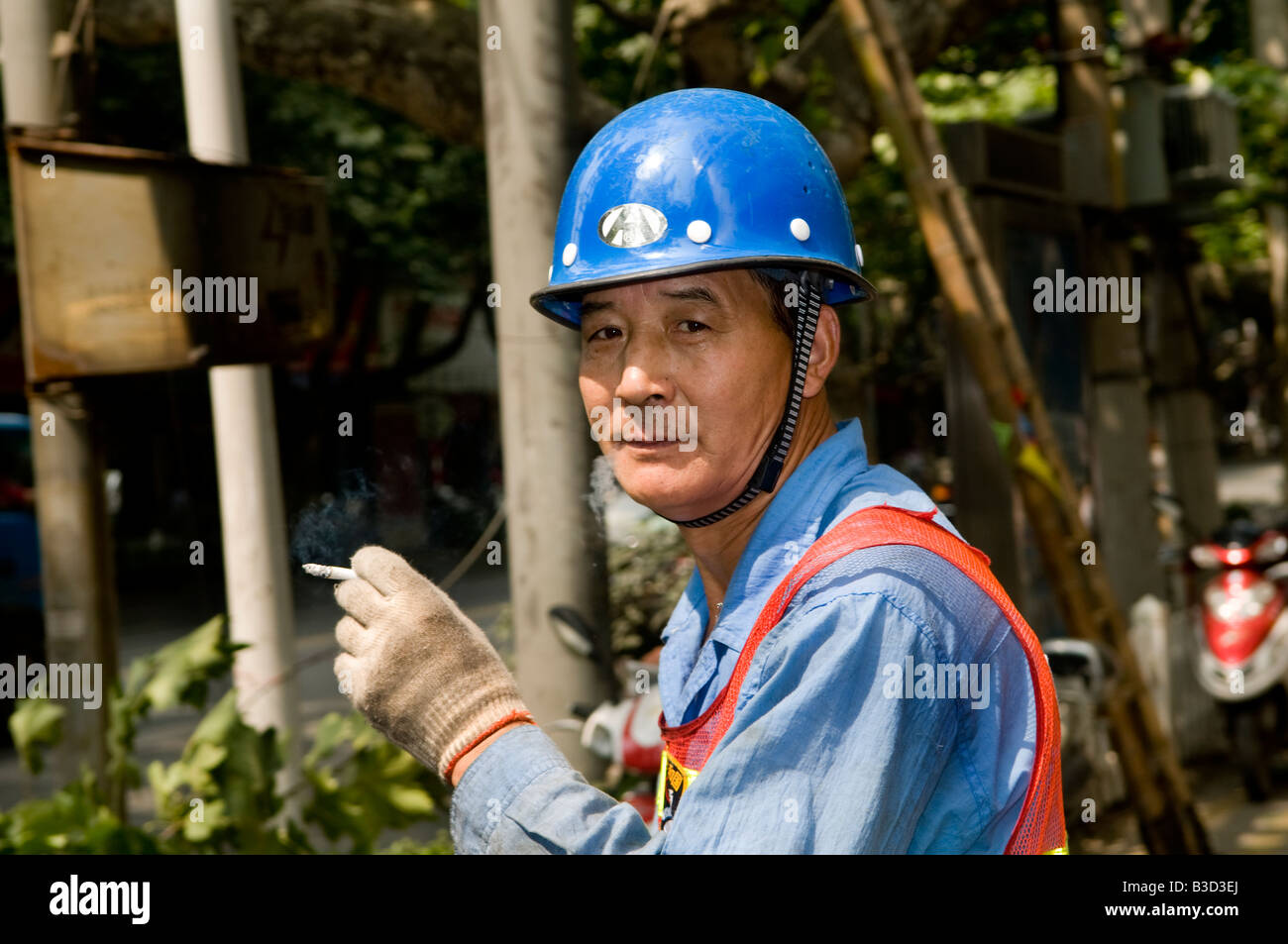 Portrait of a Chinese Electric worker Stock Photo - Alamy