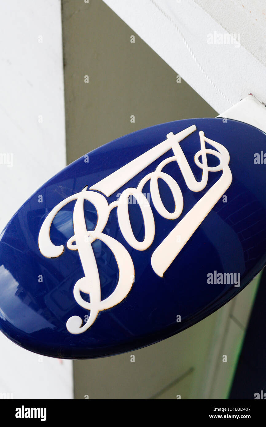 Boots shop sign Stock Photo - Alamy