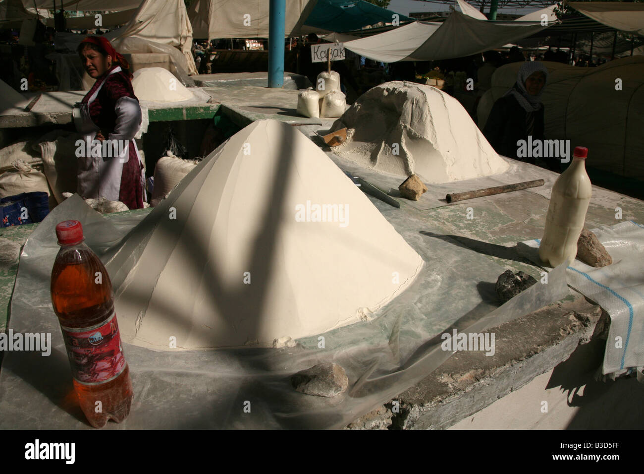 Vendor selling flour at the central market in Urgench, Uzbekistan Stock ...