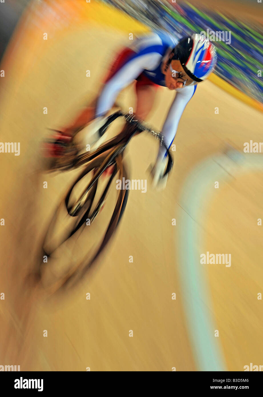 Rider competes in men individual pursuit cycling track race at the 2008 ...